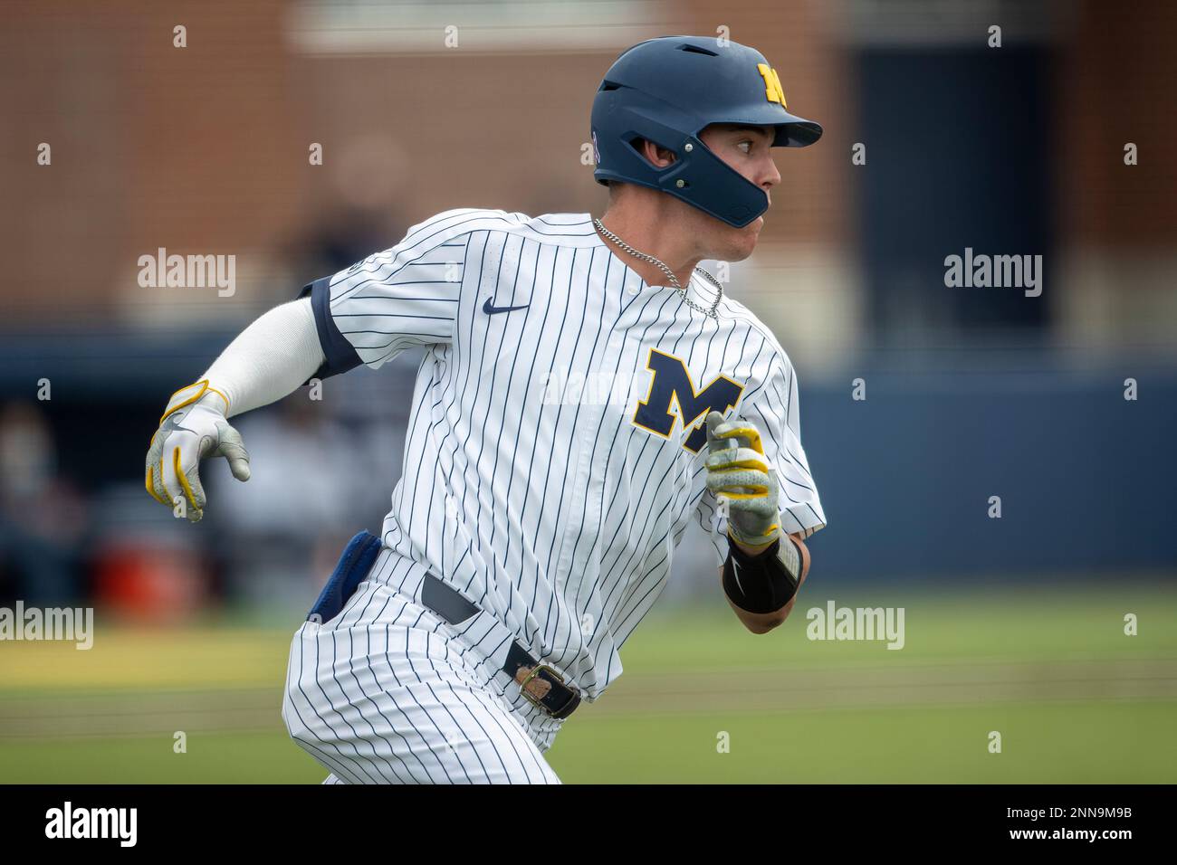Michigan Wolverines shortstop Benjamin Sems (2) rounds first base ...