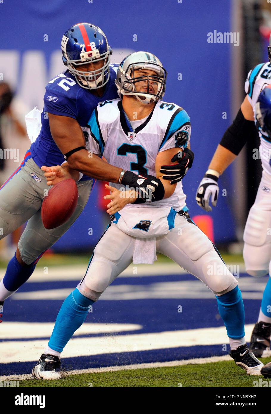 12 September 2010: Carolina Panthers quarterback Matt Moore (3) gets tackled by New York Giants ...
