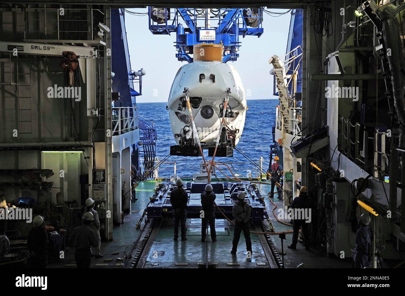 Shinkai 6500 is lifted from the mother ship off the coast of Suruga Bay ...