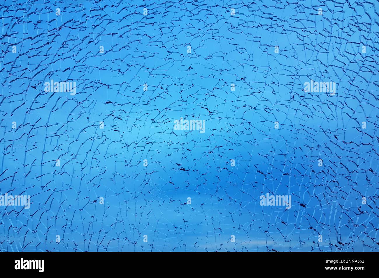 Abstract blue broken cracked glass window Stock Photo - Alamy