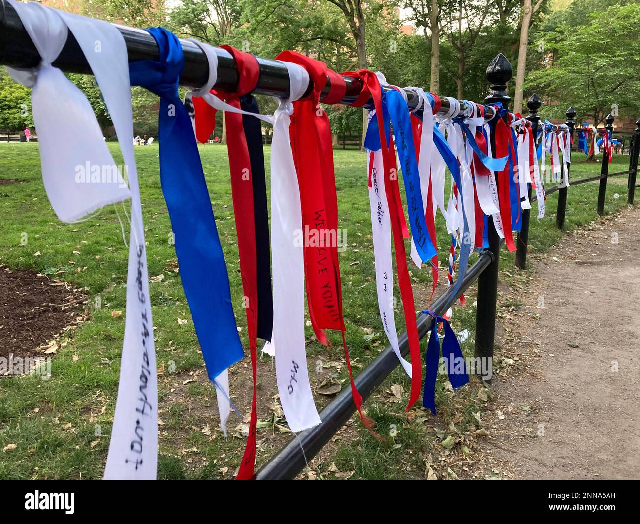 Photo by: STRF/STAR MAX/IPx 2021 5/25/21 People hang ribbons ahead of ...