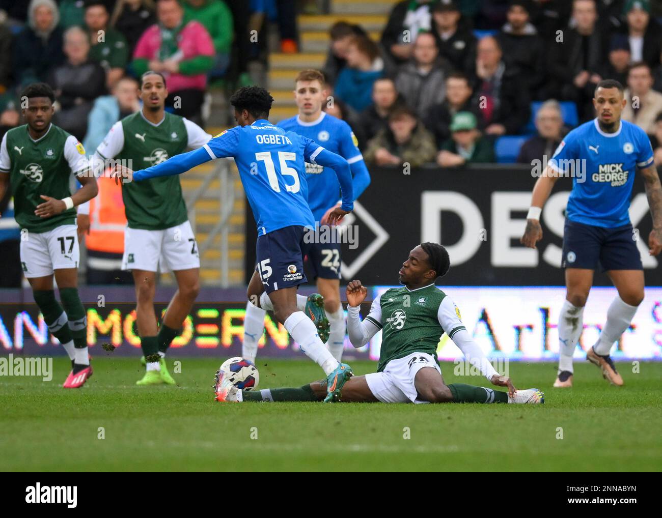 Plymouth Argyle midfielder Jay Matete (28) sliding tackle during the ...