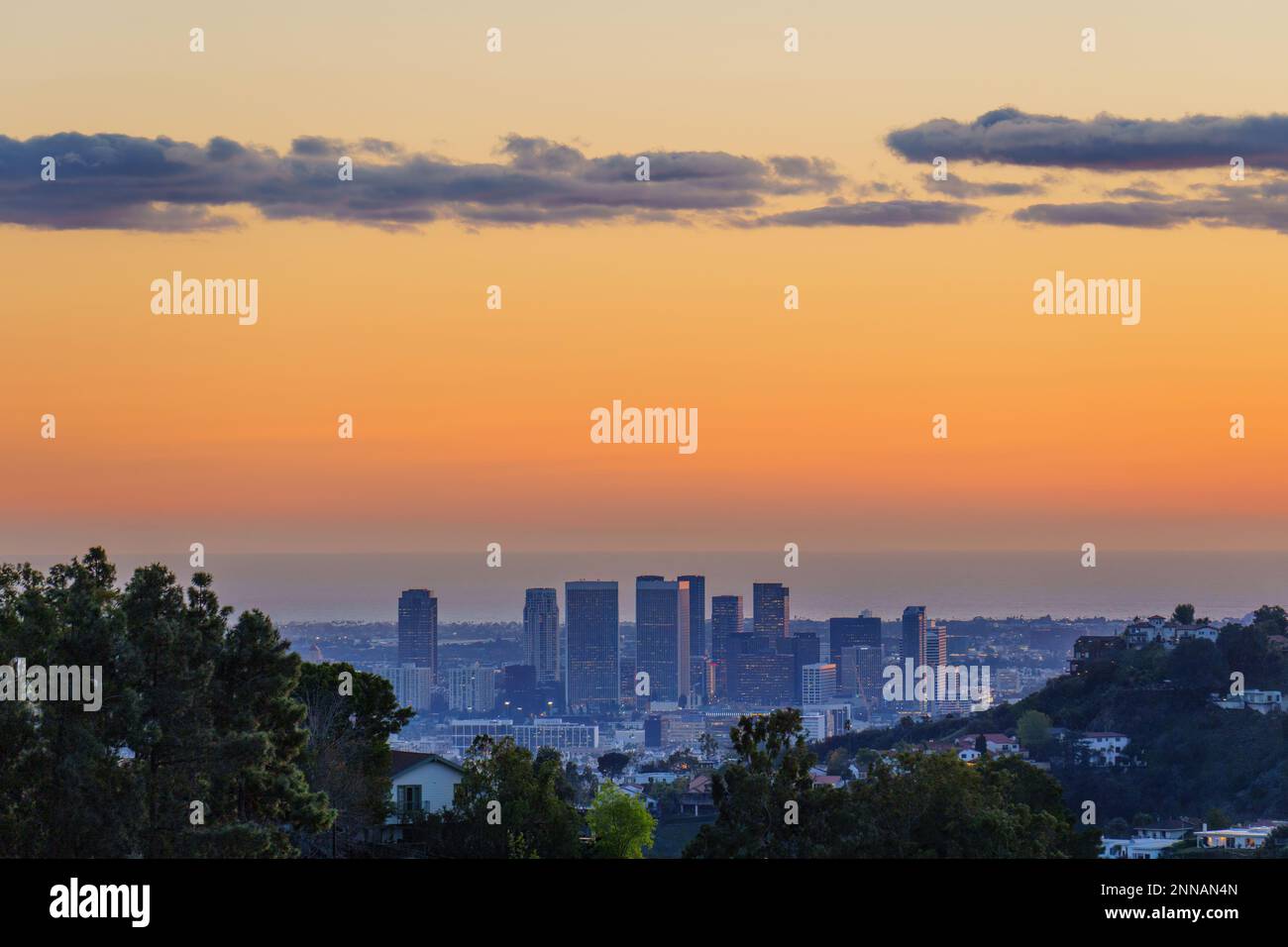 Vibrant beauty of Los Angeles downtown at sunset. The sky is ablaze ...