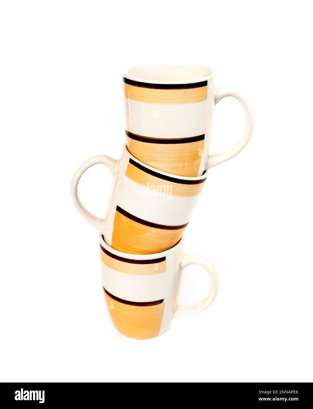 Stack of three mugs isolated on white background Stock Photo - Alamy