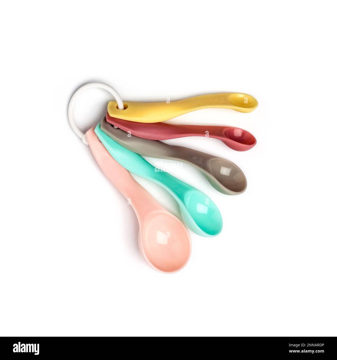Set of colorful plastic measuring spoon isolated on white background ...