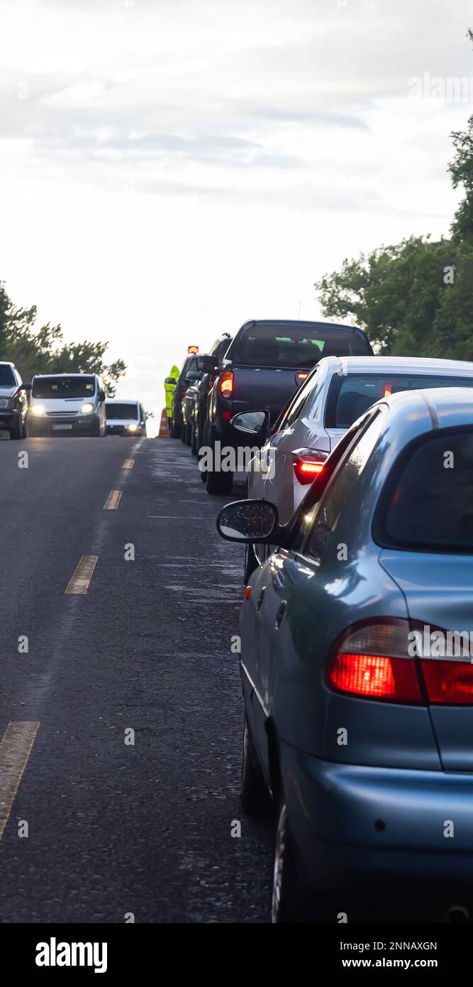 traffic jams on the road are associated with the repair of the roadway ...