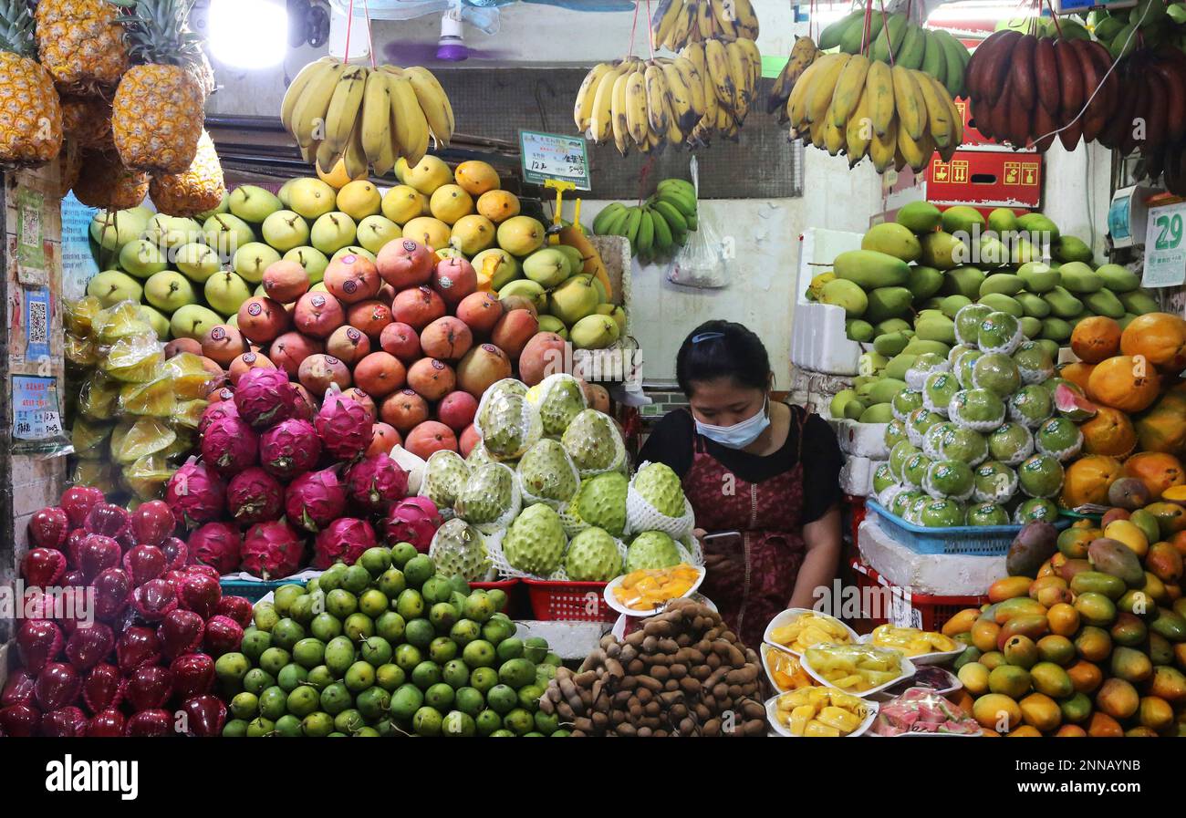 A stall sells colorful fruits in Sanya, Hainan on April 29, 2021 ...