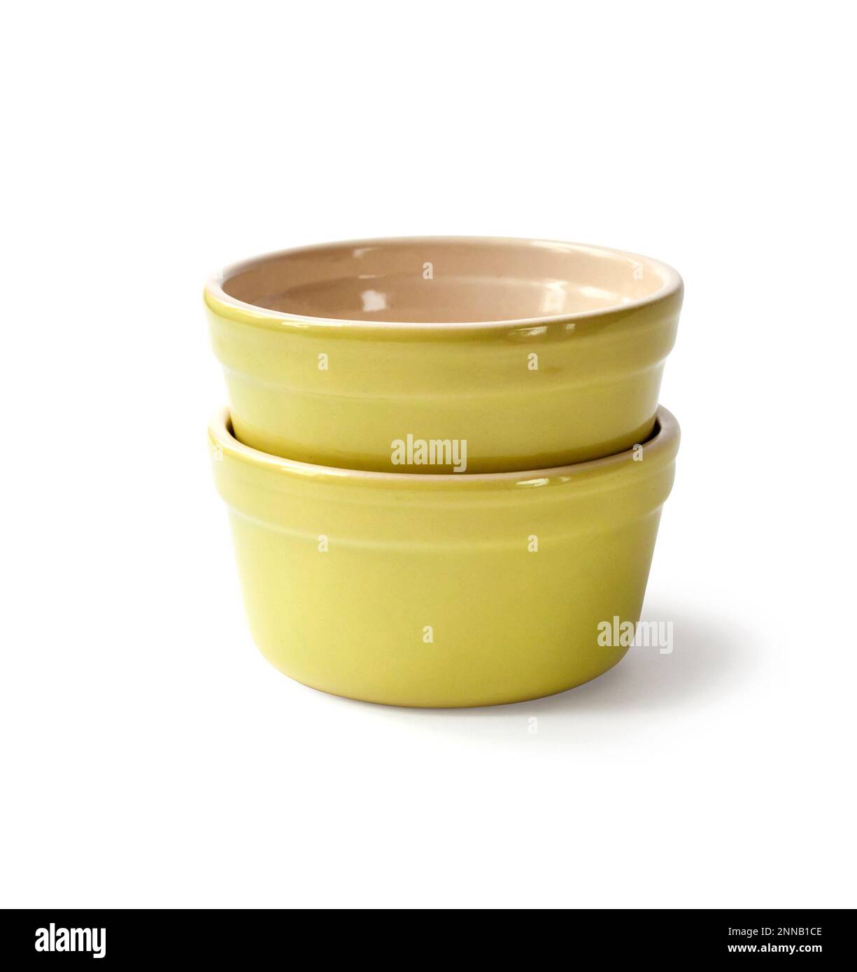 Glazed ceramic pots for cooking on a white background with clipping ...