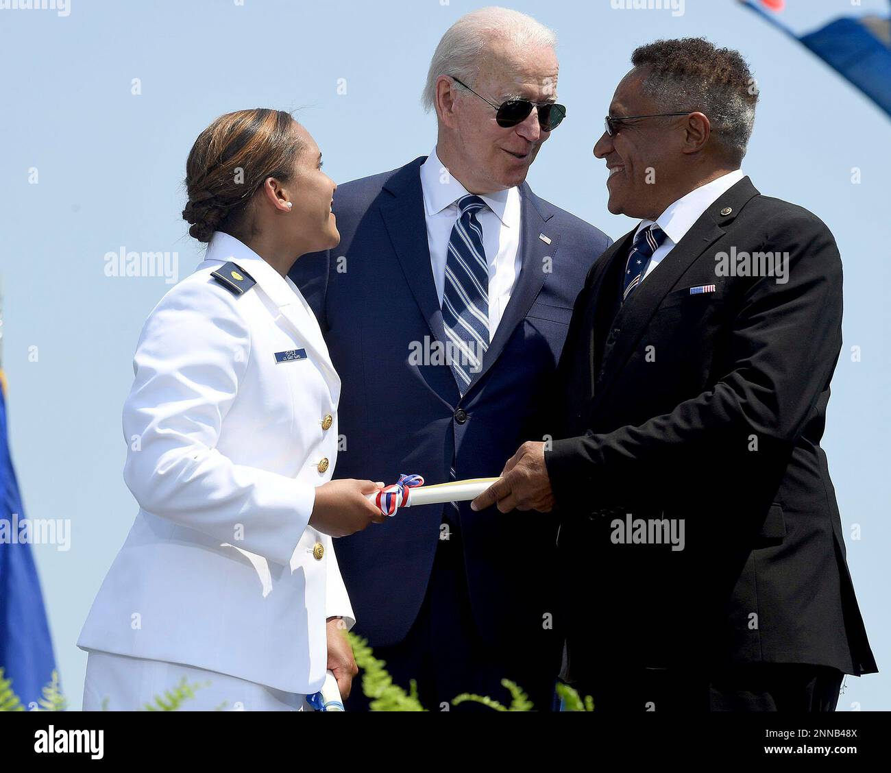 President Joseph R. Biden, center, talks with Cadet Maylis Yepez Burac ...