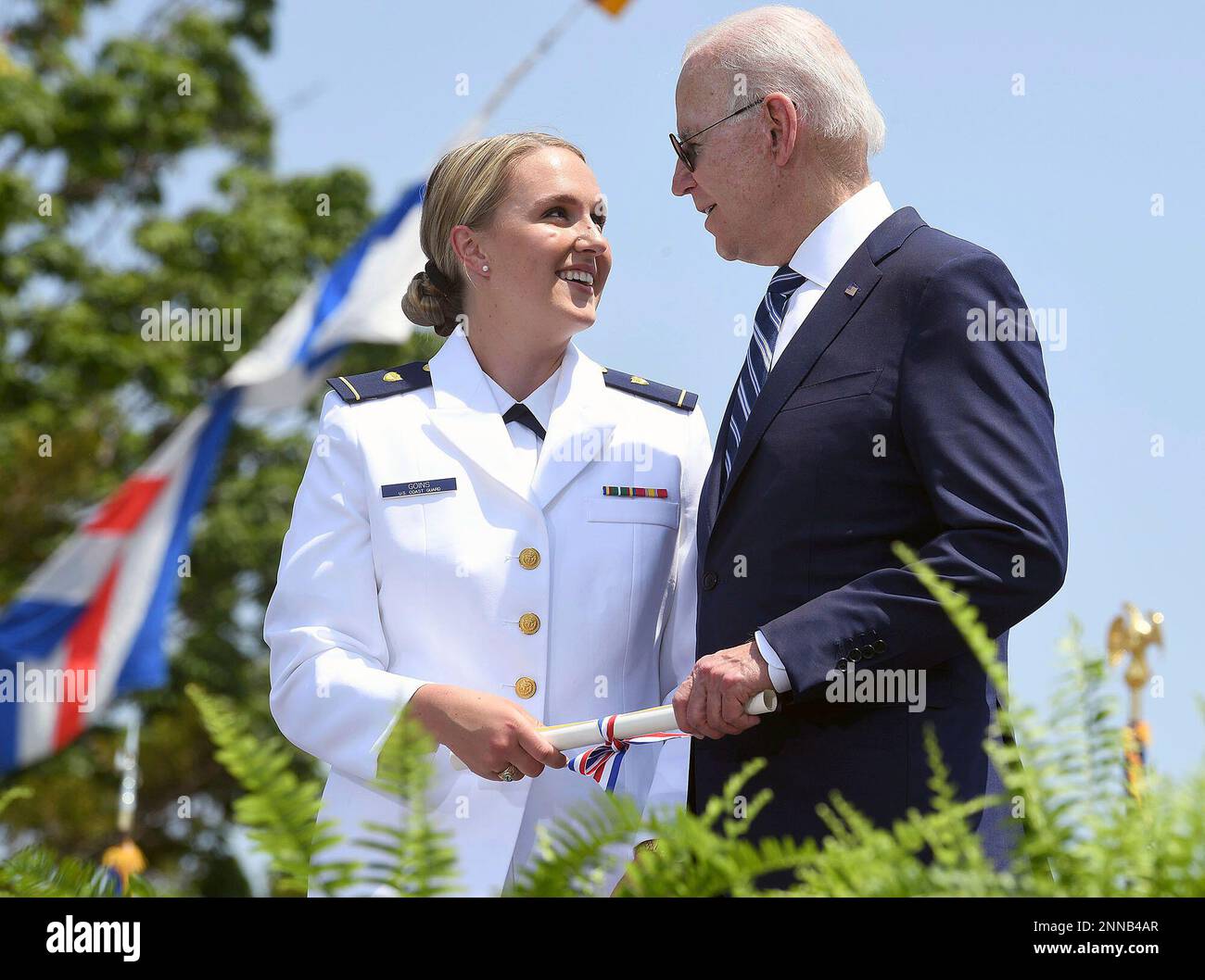 Cadet Mary Goins talks with President Joe Biden as she receives her ...