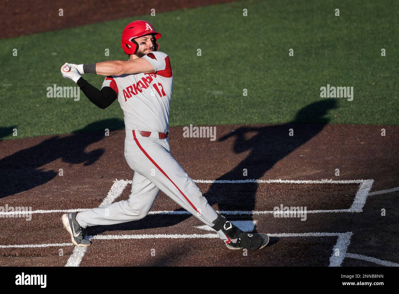 Arkansas Razorbacks catcher Casey Opitz (12) at bat against the ...