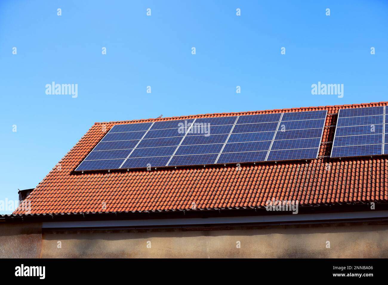 Solar panel installed on a roof Stock Photo - Alamy