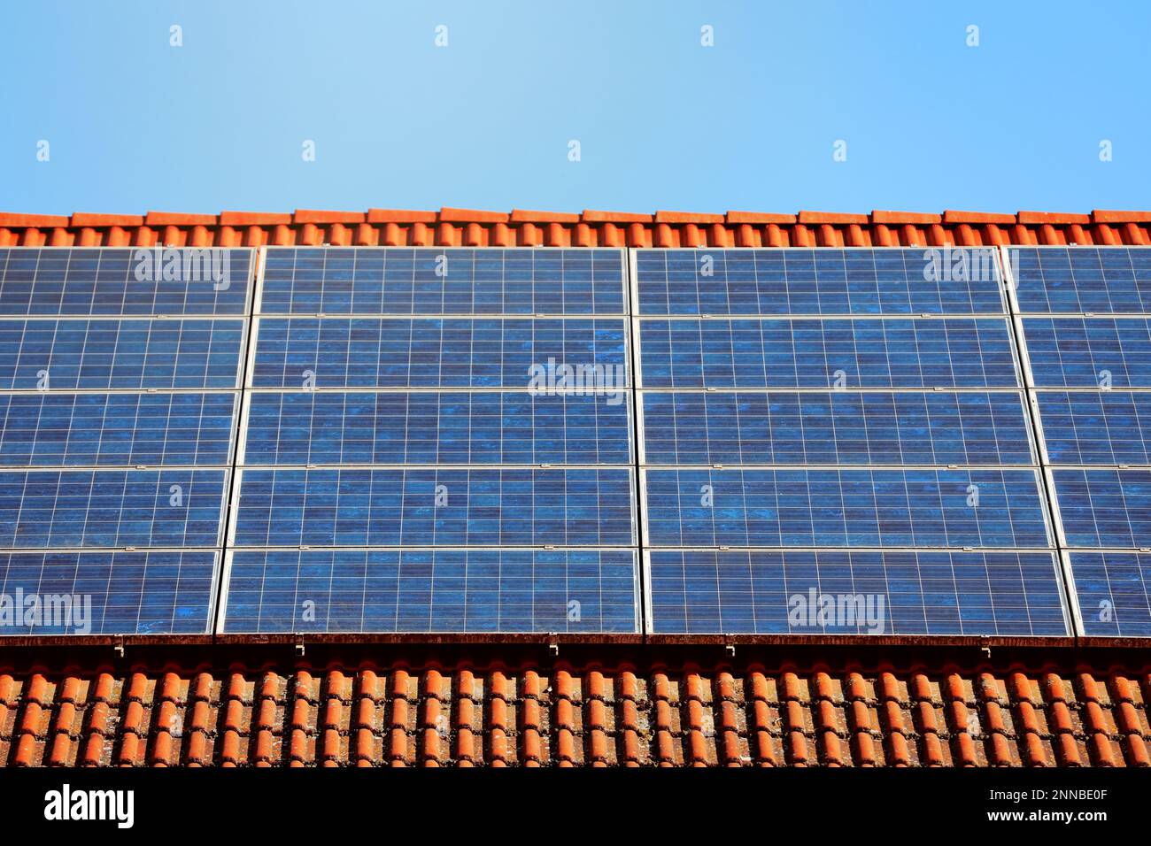 Solar panel installed on a roof Stock Photo - Alamy