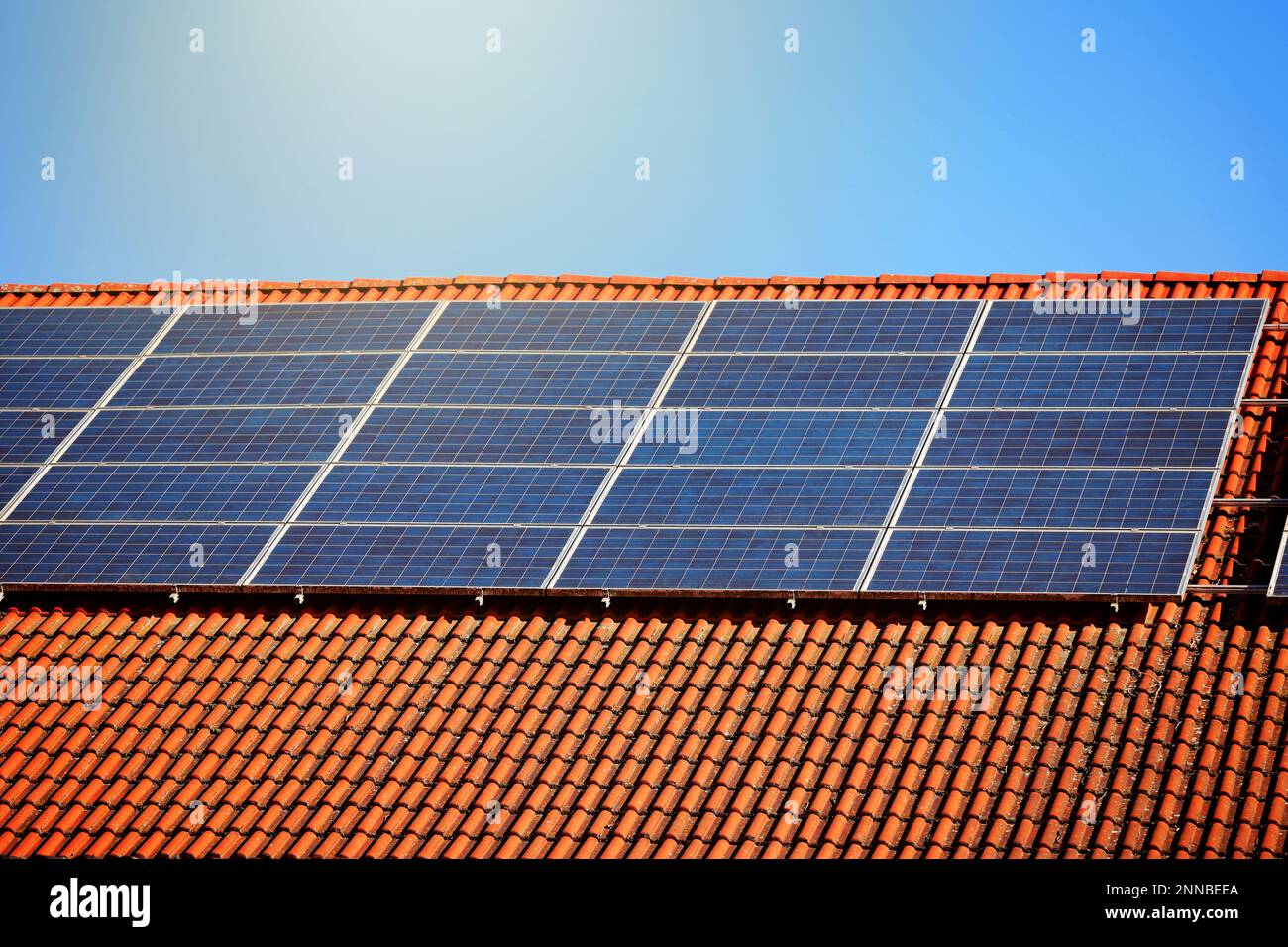Solar panel installed on a roof Stock Photo - Alamy