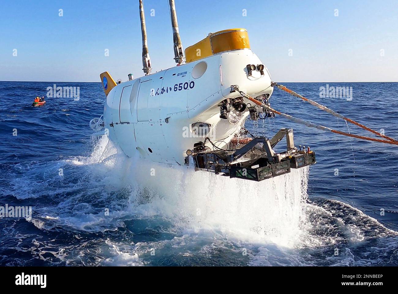 Shinkai 6500 is lifted from the mother ship off the coast of Suruga Bay ...