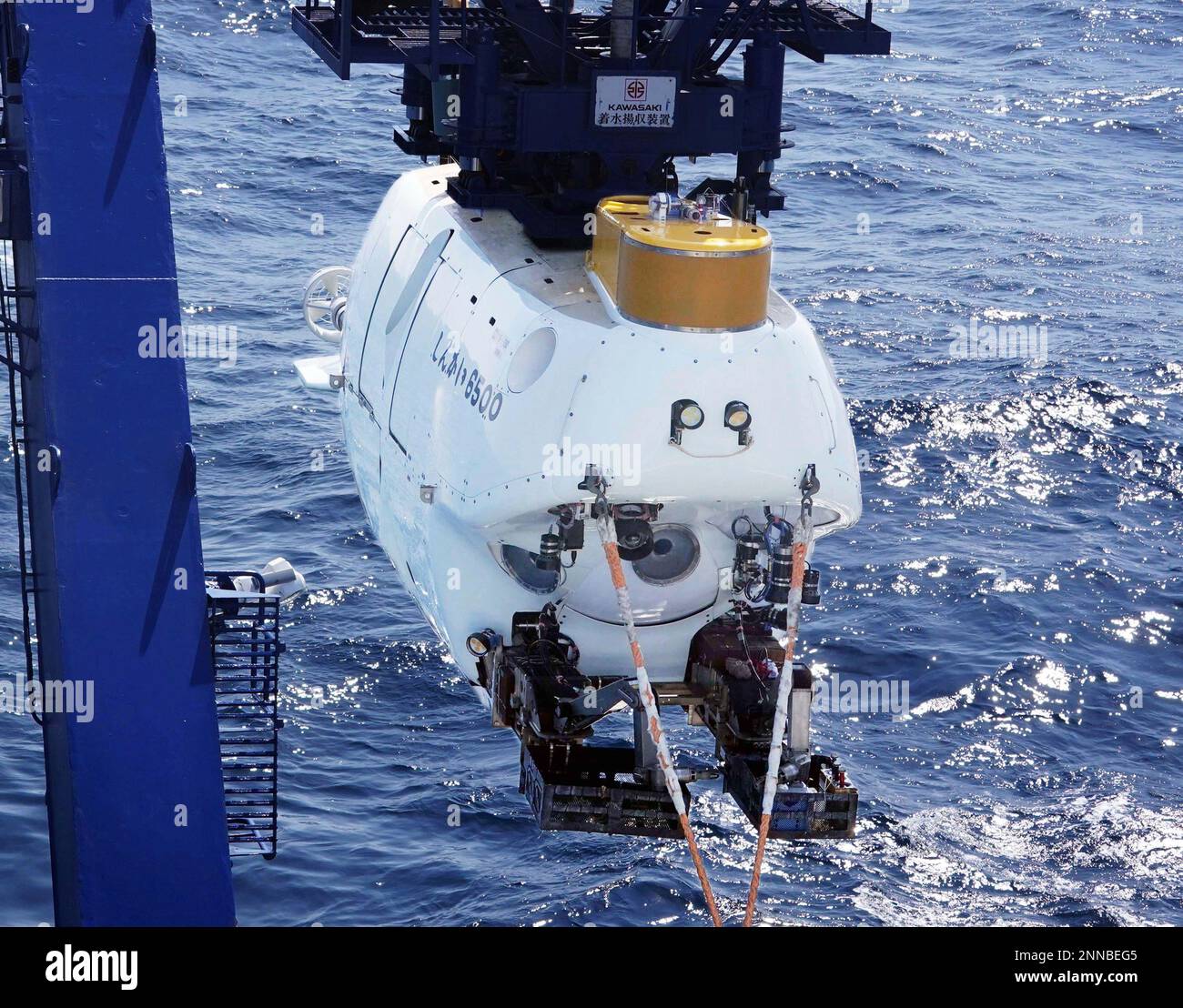 Shinkai 6500 is lifted from the mother ship off the coast of Suruga Bay ...