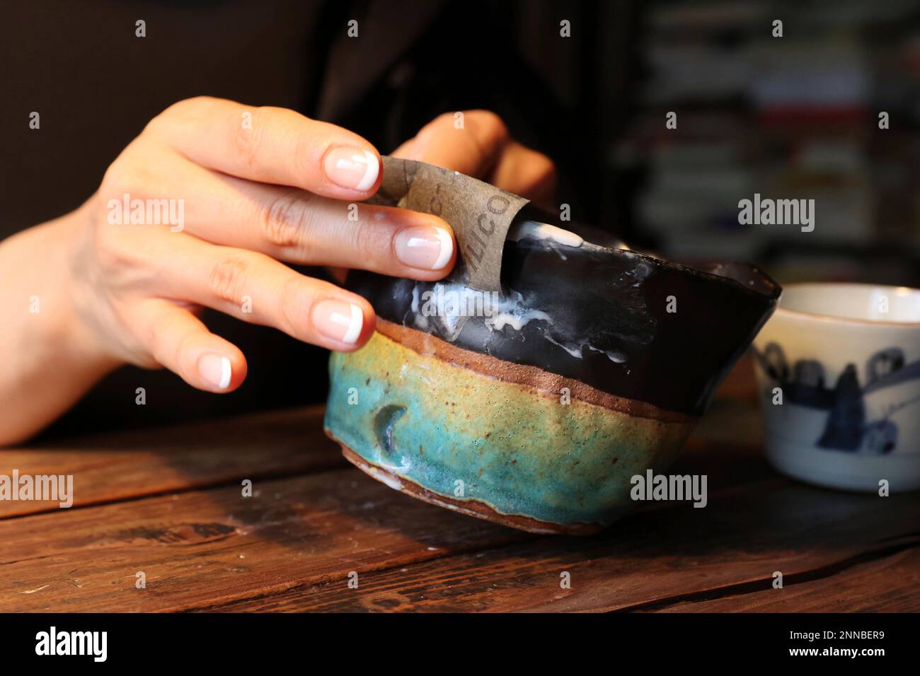A picture shows one of the procedures of Kintsugi, Japanese traditional ...