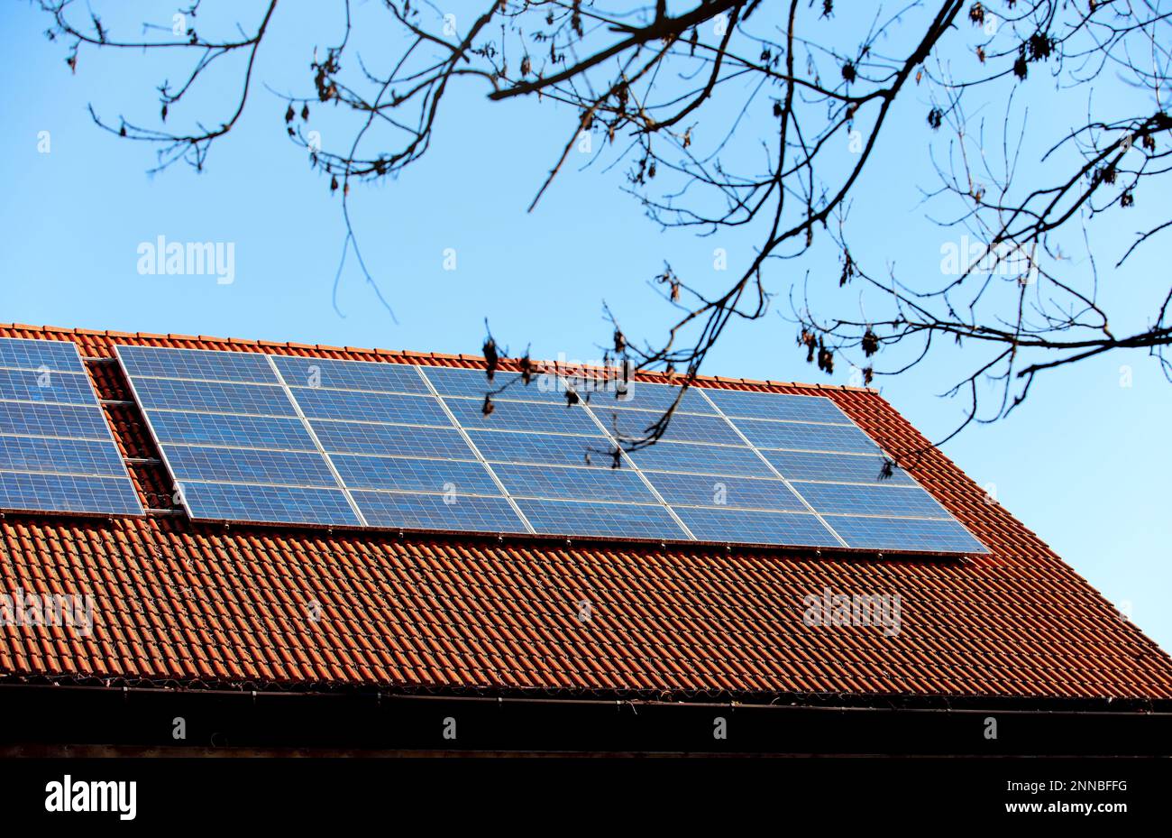 Solar panel installed on a roof Stock Photo - Alamy