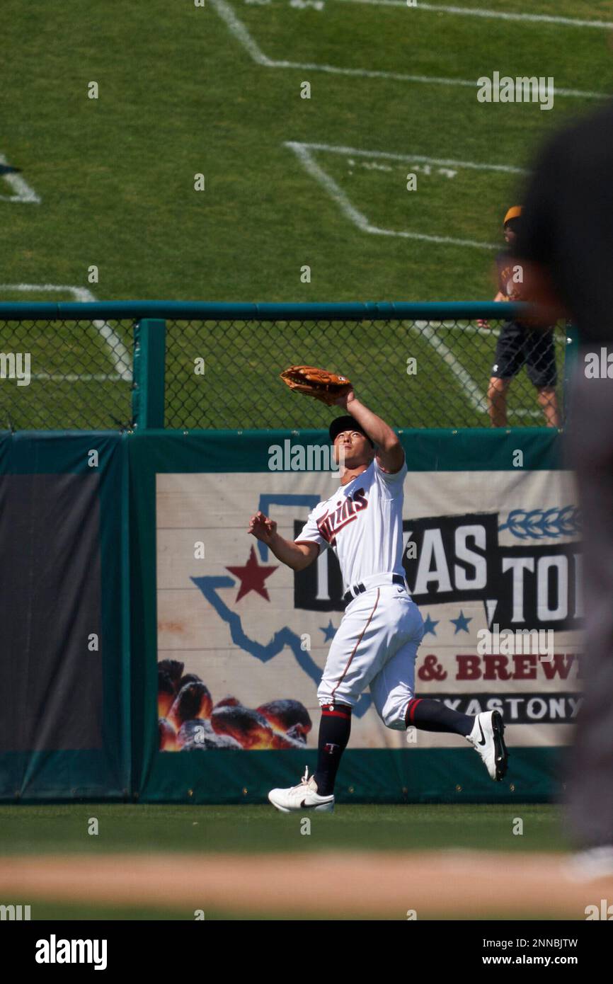 Minnesota Twins outfielder Rob Refsnyder (38) catches a fly ball during ...