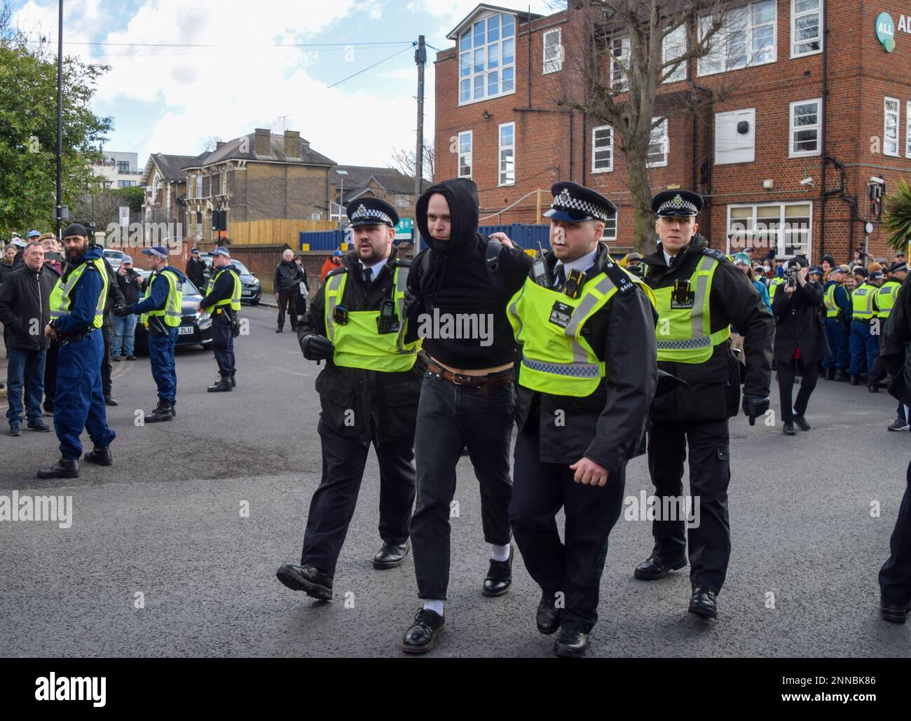 London, UK. 25th February 2023. Police arrest a pro- LGBTQ+ counter ...