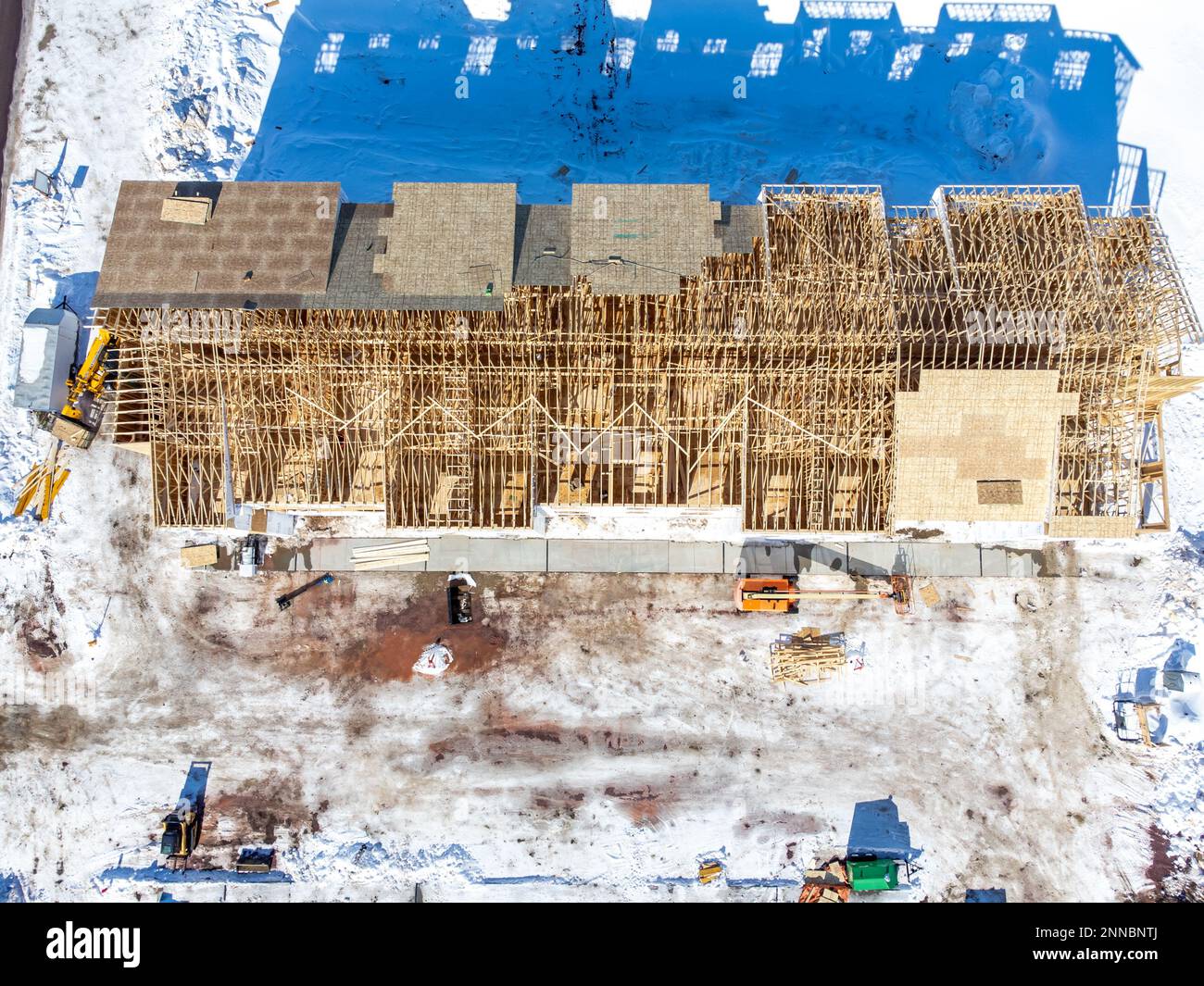 Aerial drone view of a multifamily apartment complex under construction ...