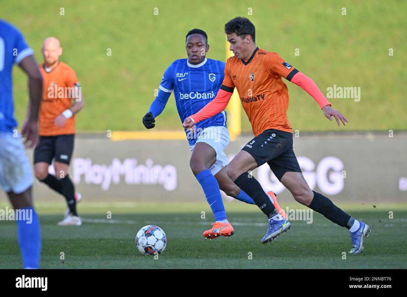 Jong Genk's Kelvin Pius John and Deinze's Leon Teo Quintero pictured in ...