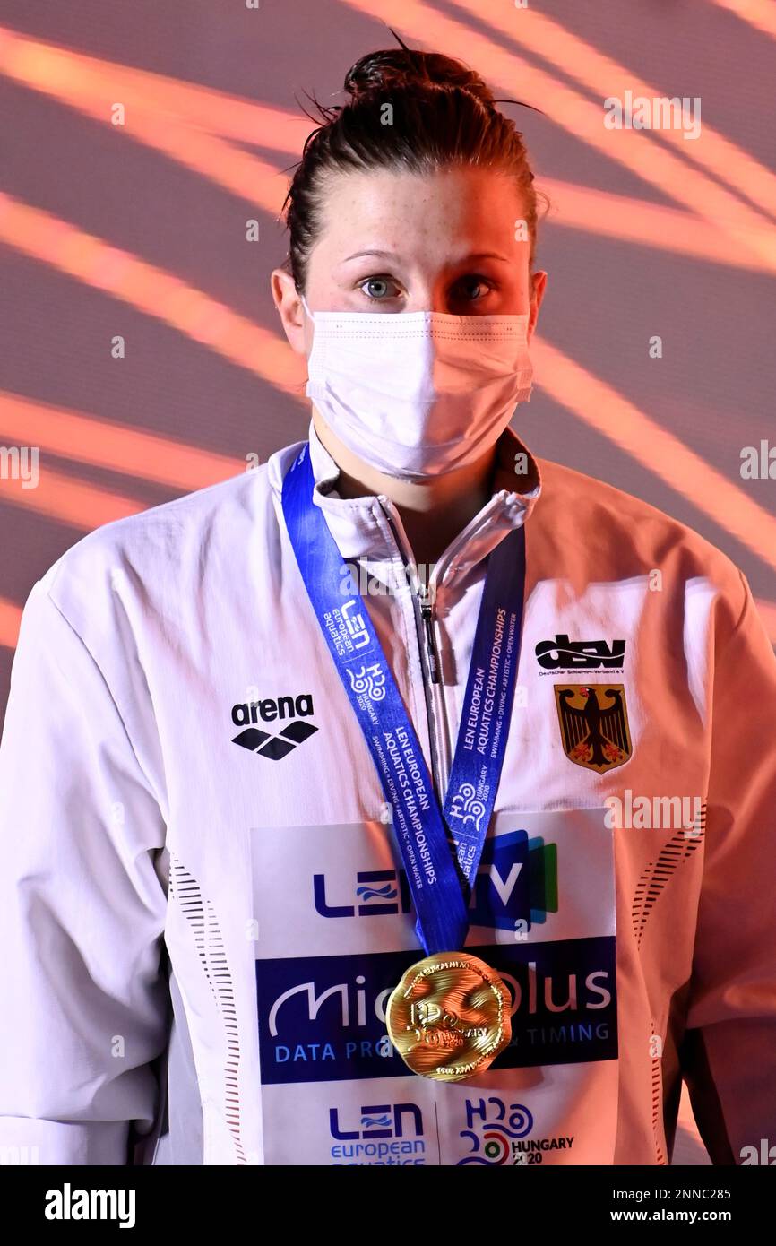 Gold medal winning Tina Punzel of Germany poses on the podium during ...