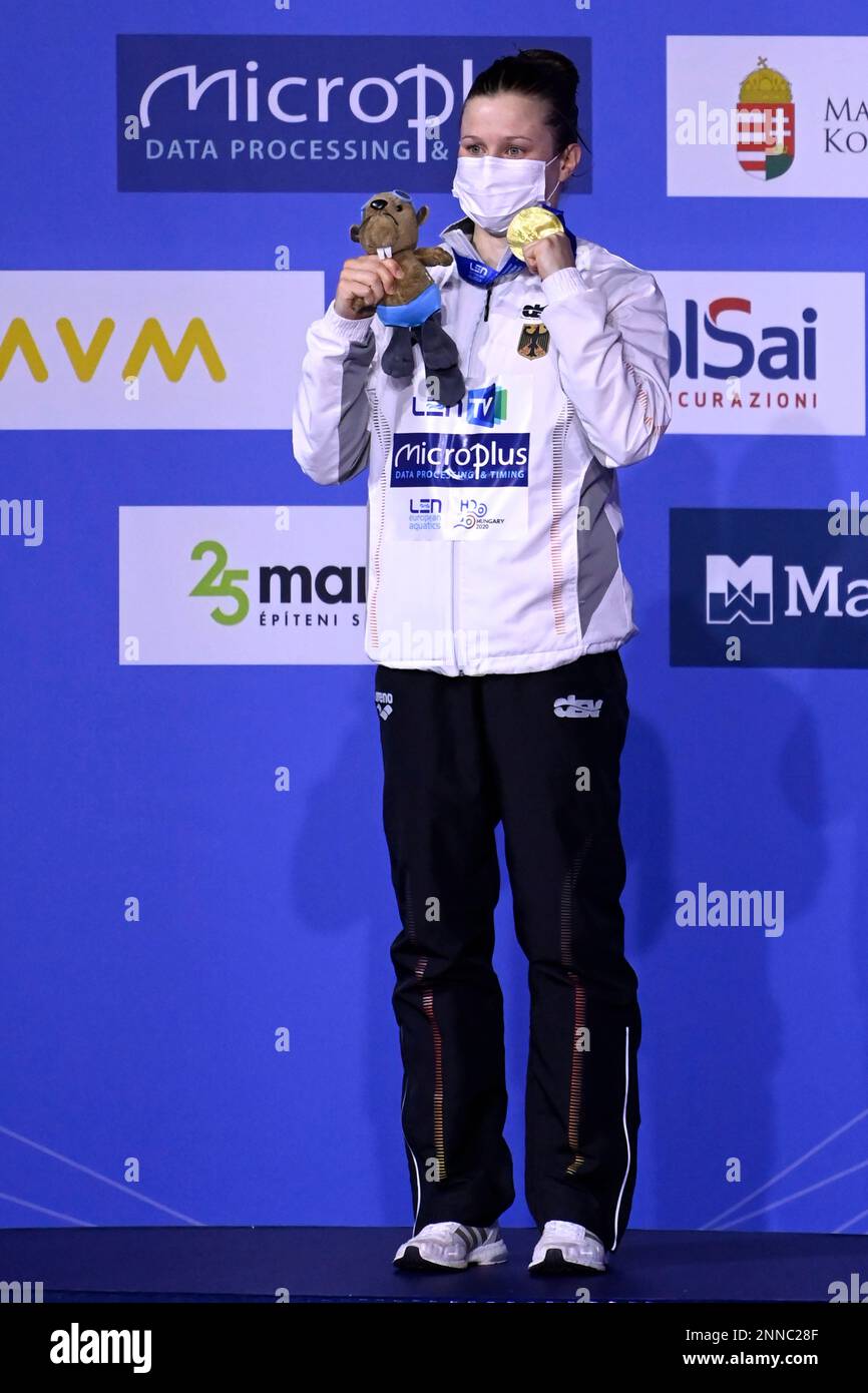 Gold medal winning Tina Punzel of Germany celebrates on the podium ...