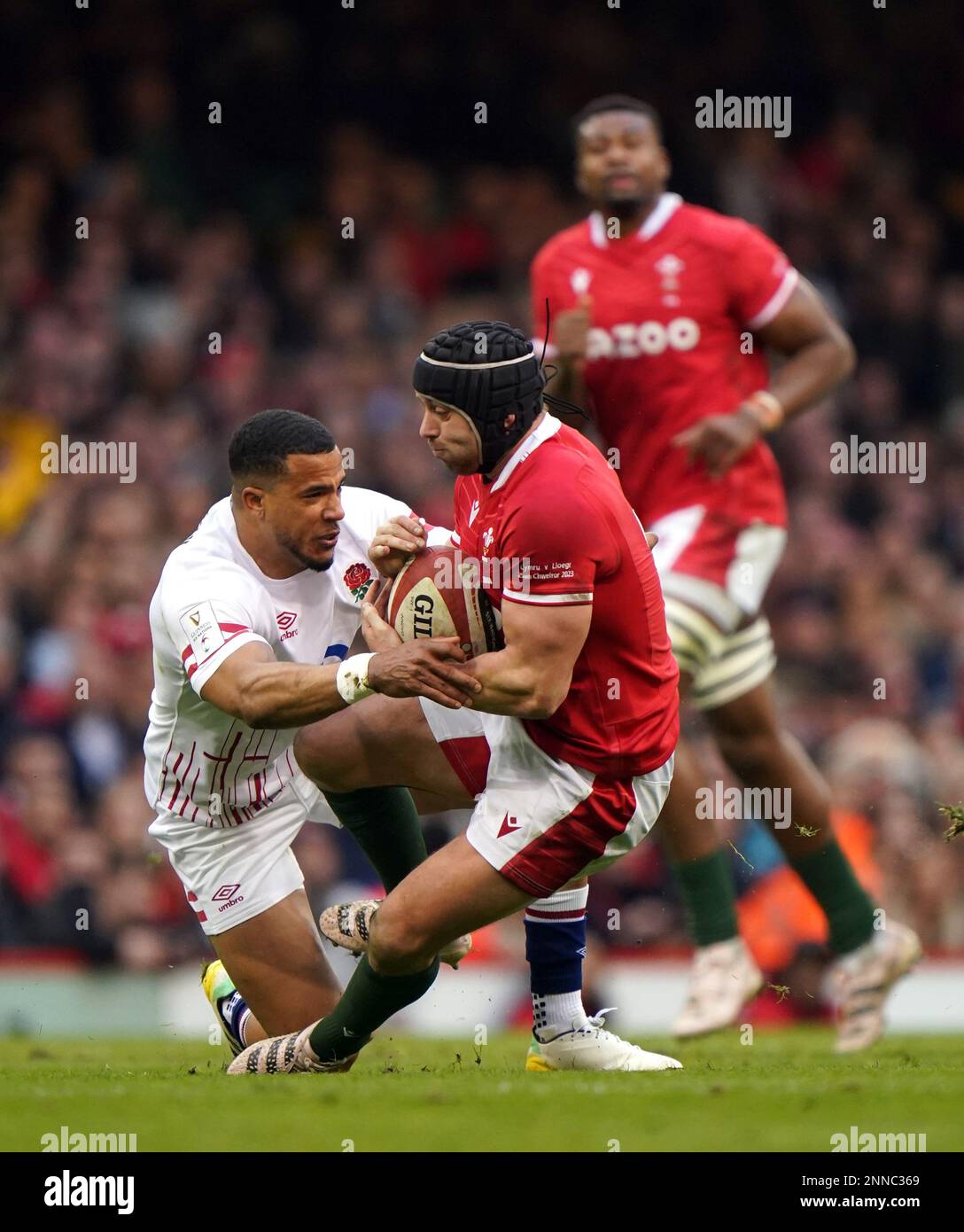 Wales' Leigh Halfpenny tackled by England's Anthony Watson during the ...
