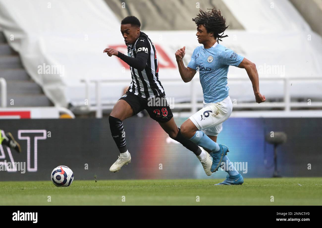 Newcastle's Joe Willock, left, and Manchester City's Nathan Ake ...