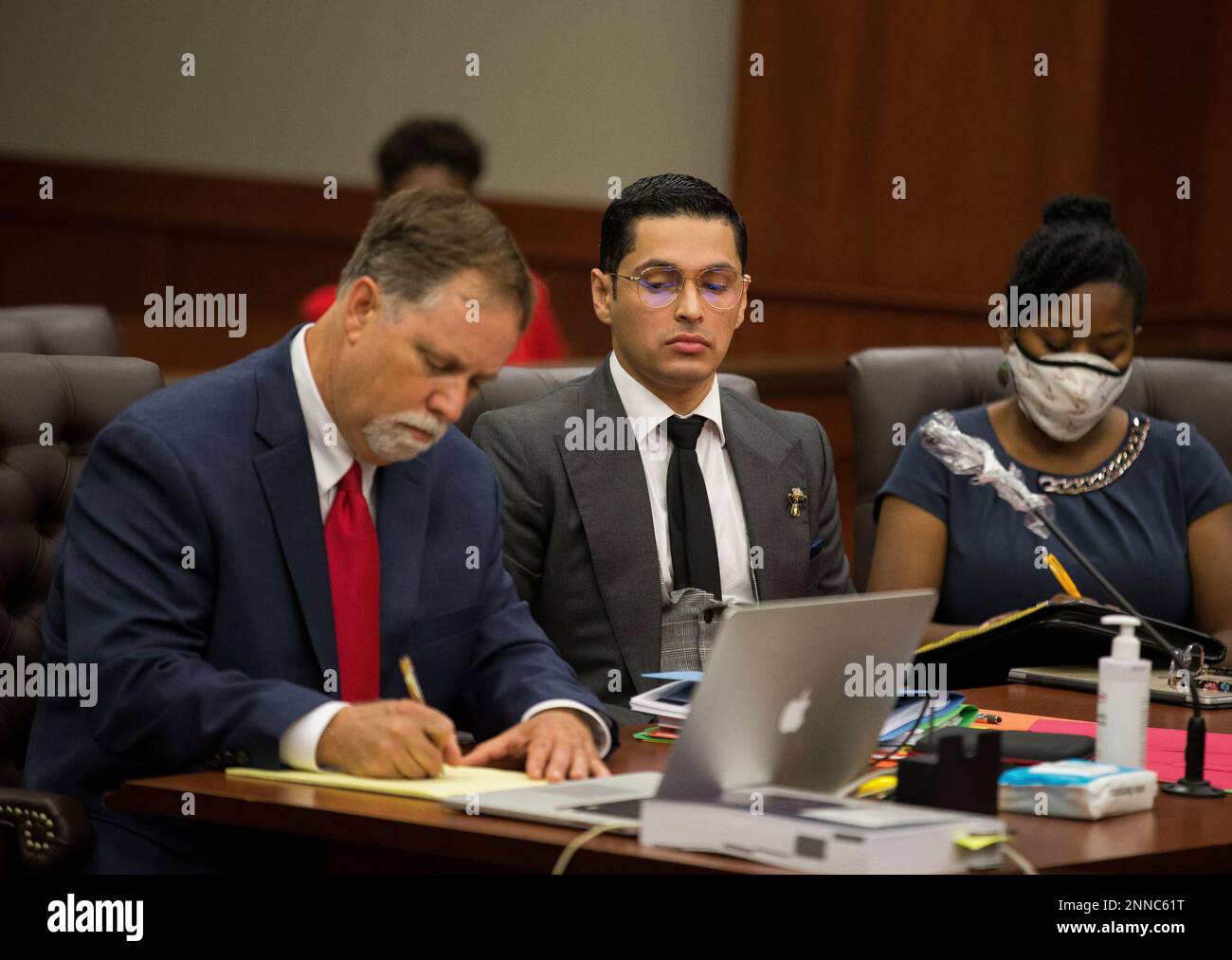Attorney Michael Elliott and his client Victor Hugo Cuevas, a 26-year ...