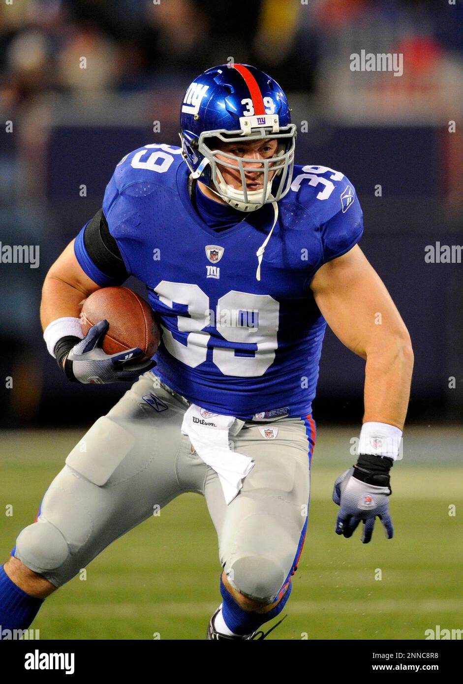 13 December 2009: New York Giants FB Madison Hedgecock (39) carries the ...