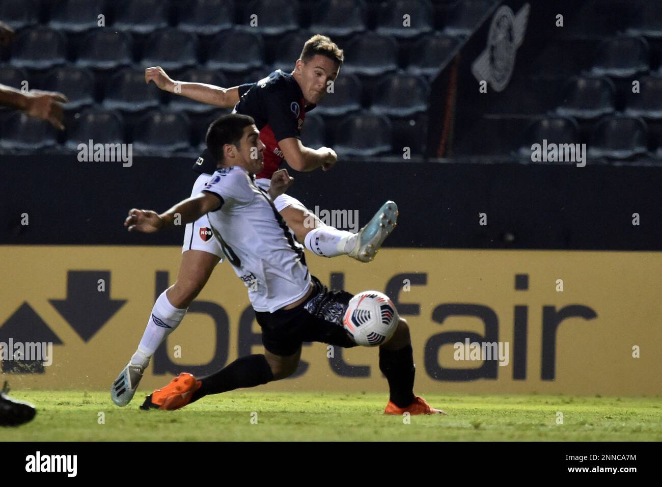 Alexis Rodriguez of Argentina's Newel's Old Boys strikes the ball as ...