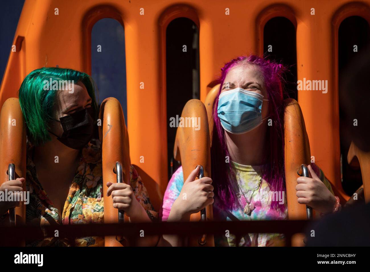Lily Ritz, left, and Esther Steed, right, prepare to ride The Tower of ...