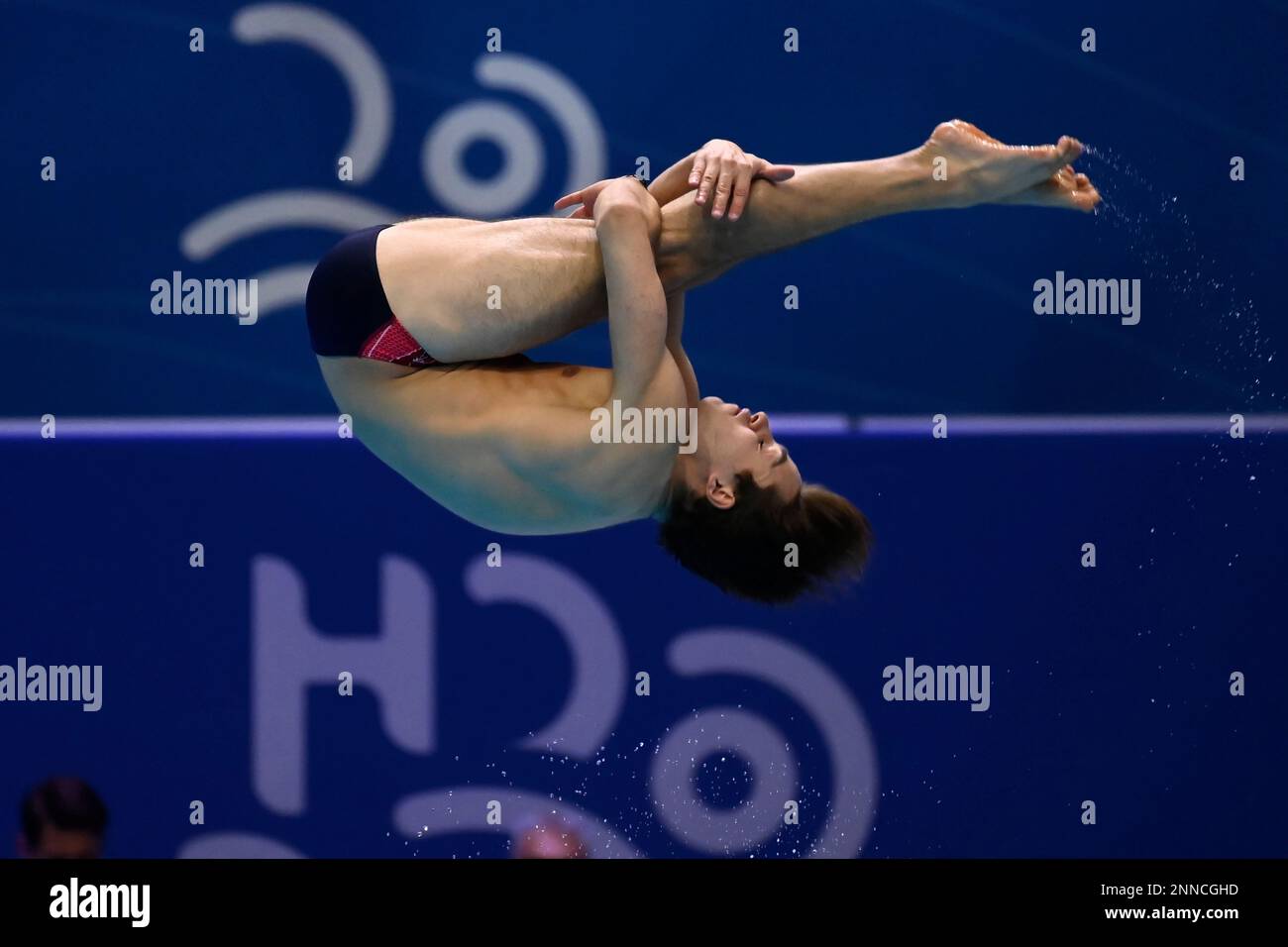 Jules Bouyer of France competes in men's diving 1m springboard final of ...