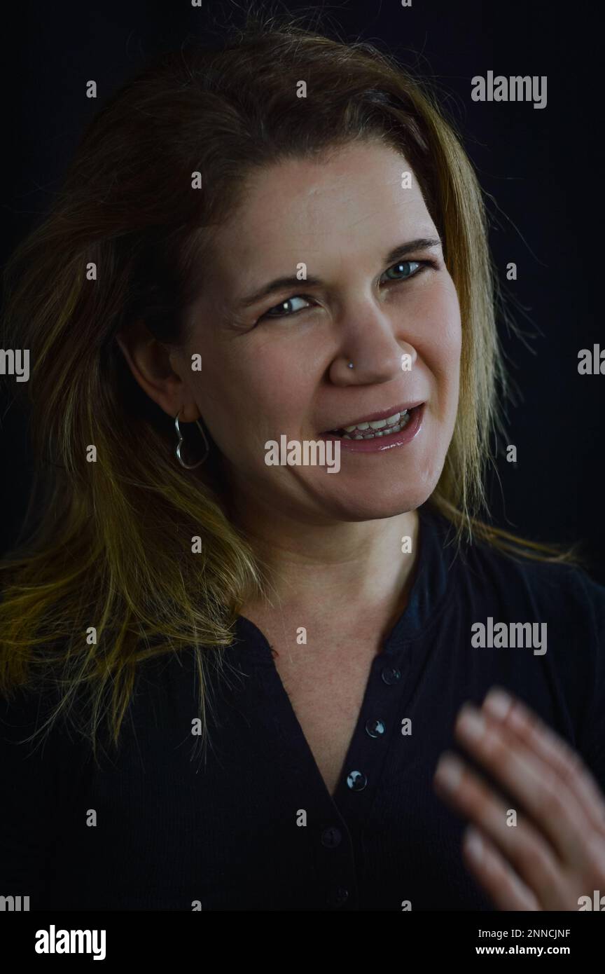 sarcasm - portrait of a beautiful and elegant blonde woman who hints at ...