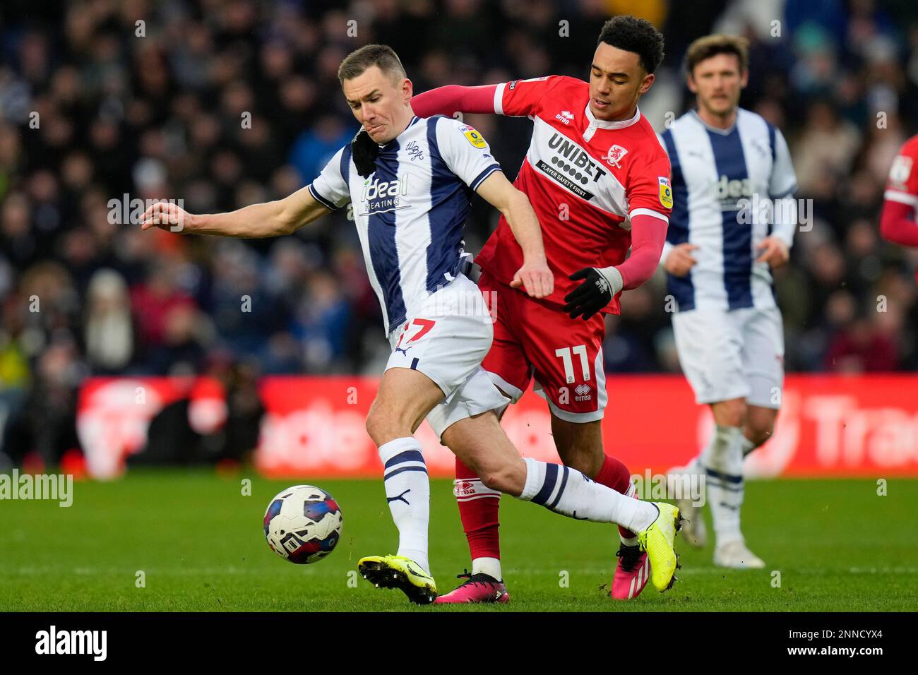 Aaron Ramsey #11 of Middlesbrough competes for the ball with Jed ...