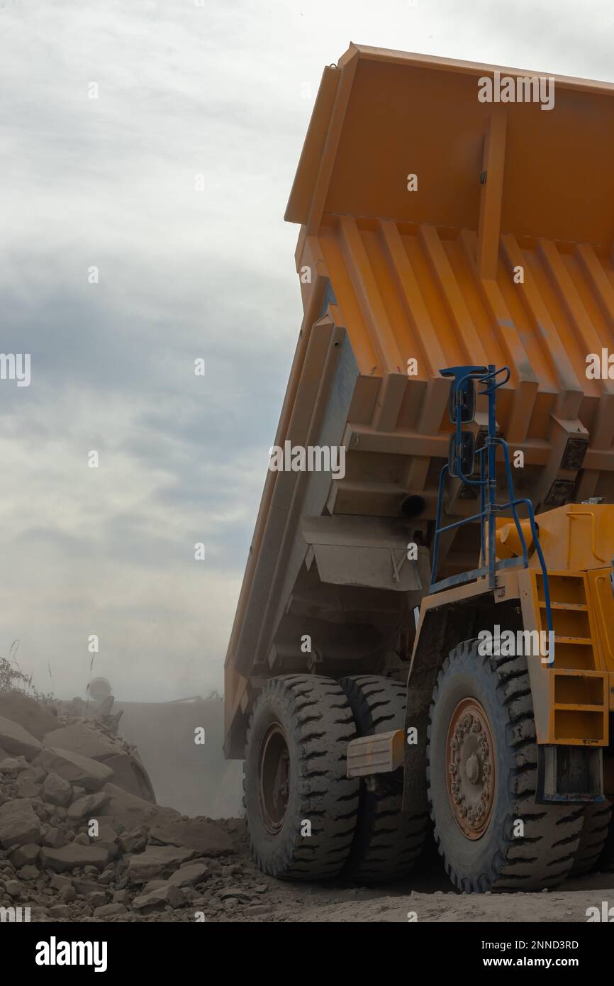 Large mining dump truck. Transport industry. Extraction of stone in an ...