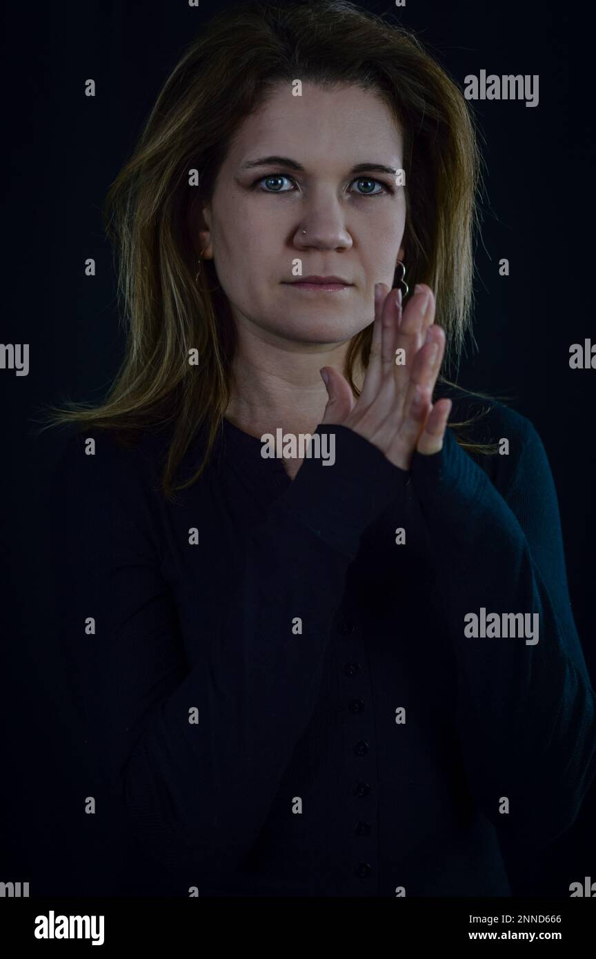 Intertwined arms hi-res stock photography and images - Alamy