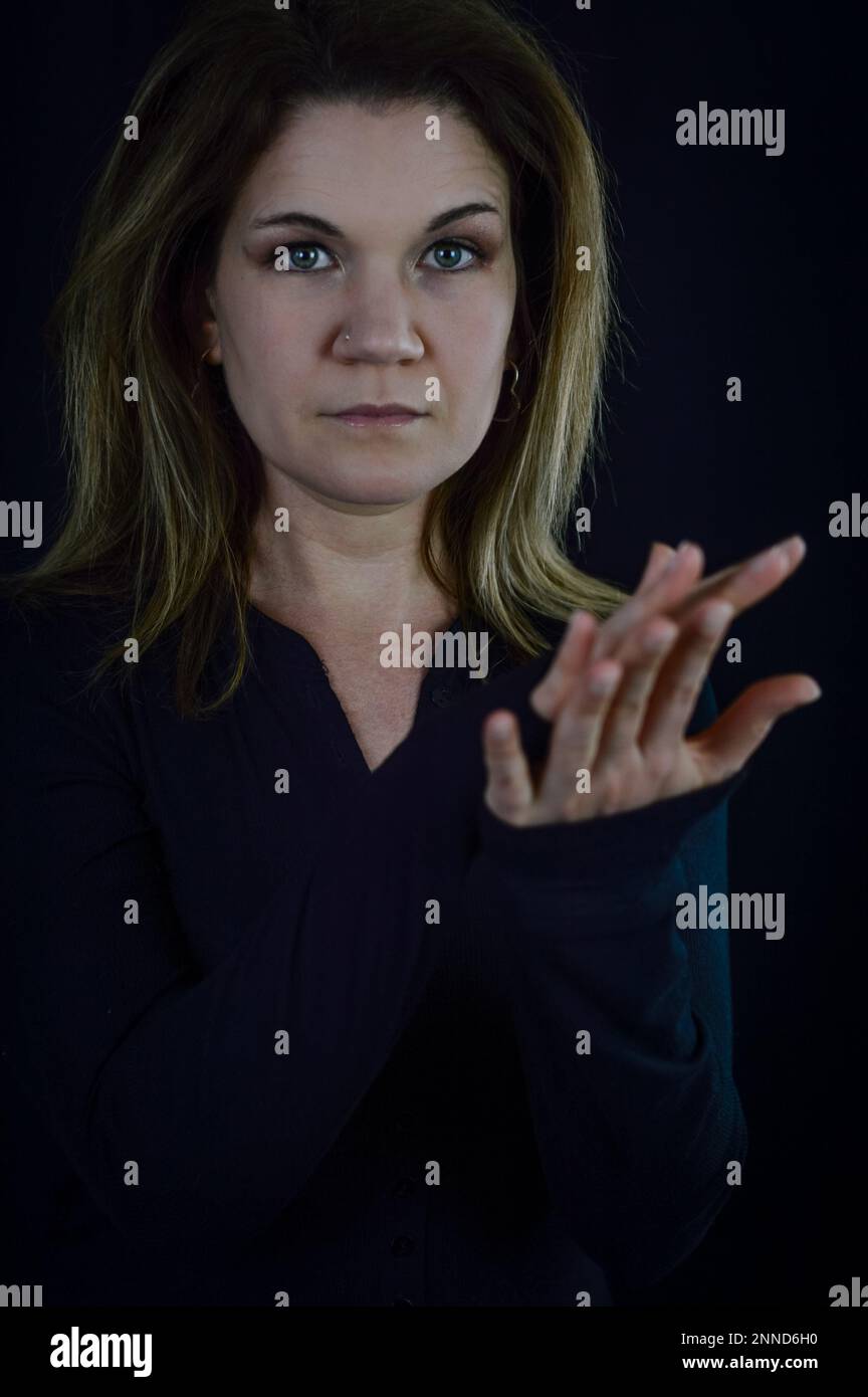 embarrassment - portrait of a beautiful blonde woman who has a lost ...