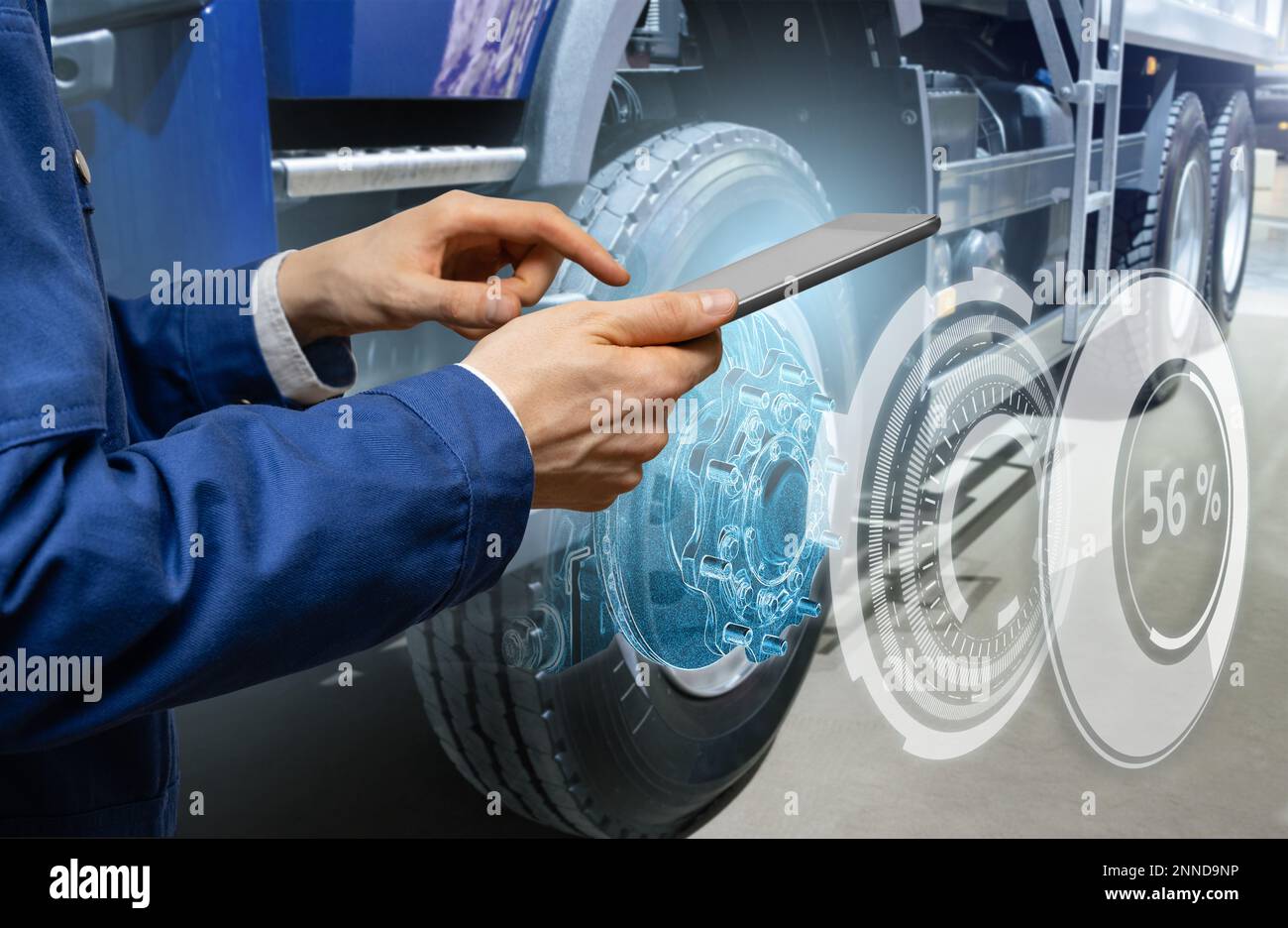 Serviceman repairing a truck using augmented reality application Stock ... Serviceman repairing a truck using augmented reality application Stock ...