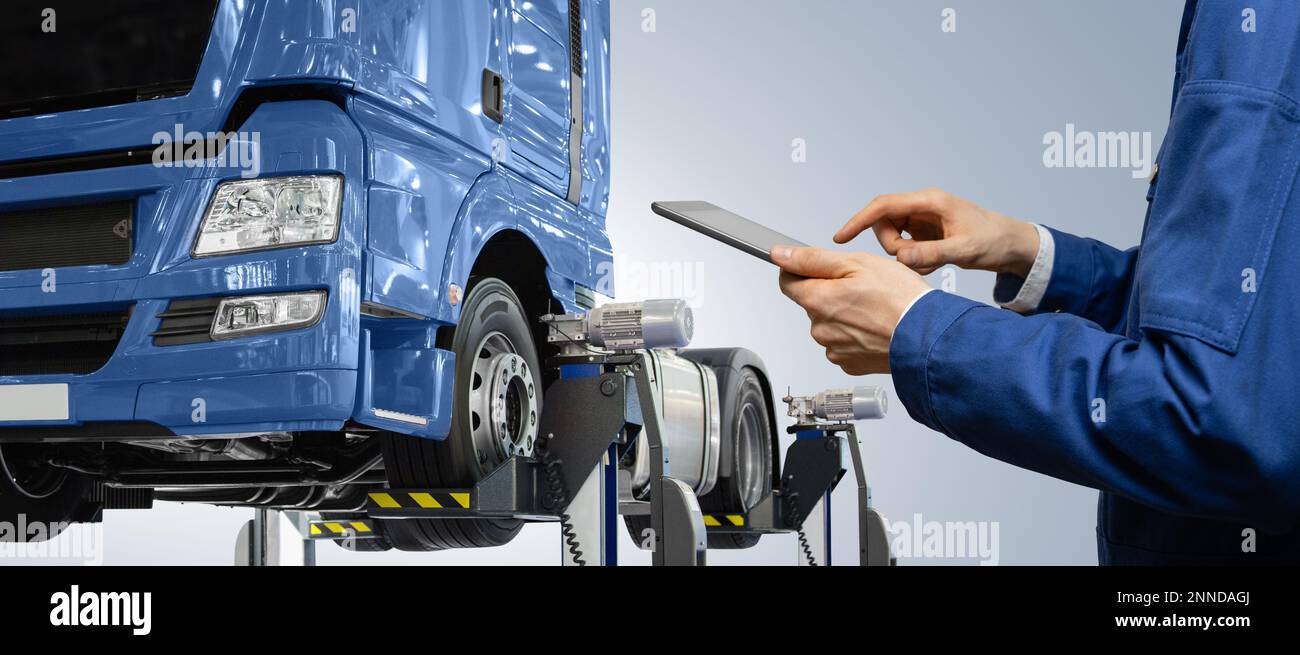 Mechanic garage tablet hi-res stock photography and images - Alamy