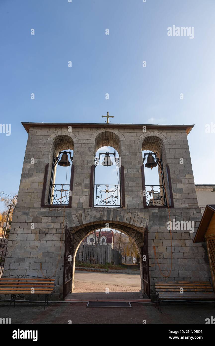 Large Church bell hanging outside. Close-up view of metal orthodox ...