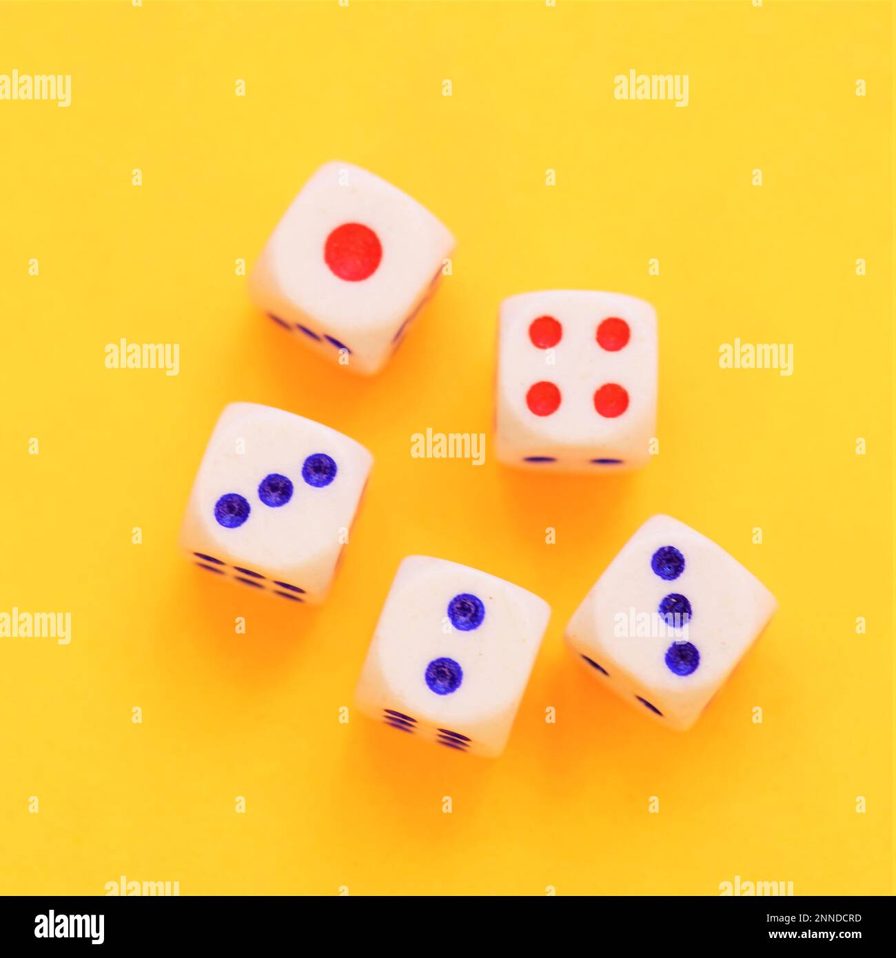 Five dice with different numbers on a orange sunny table Stock Photo ...