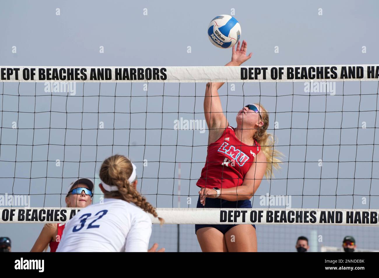 Madi Firnett of Loyola Marymount spikes the ball against Pepperdine ...