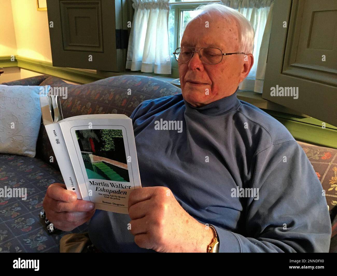 Student Jud Beltz of Latrobe reads a German-language mystery novel ...