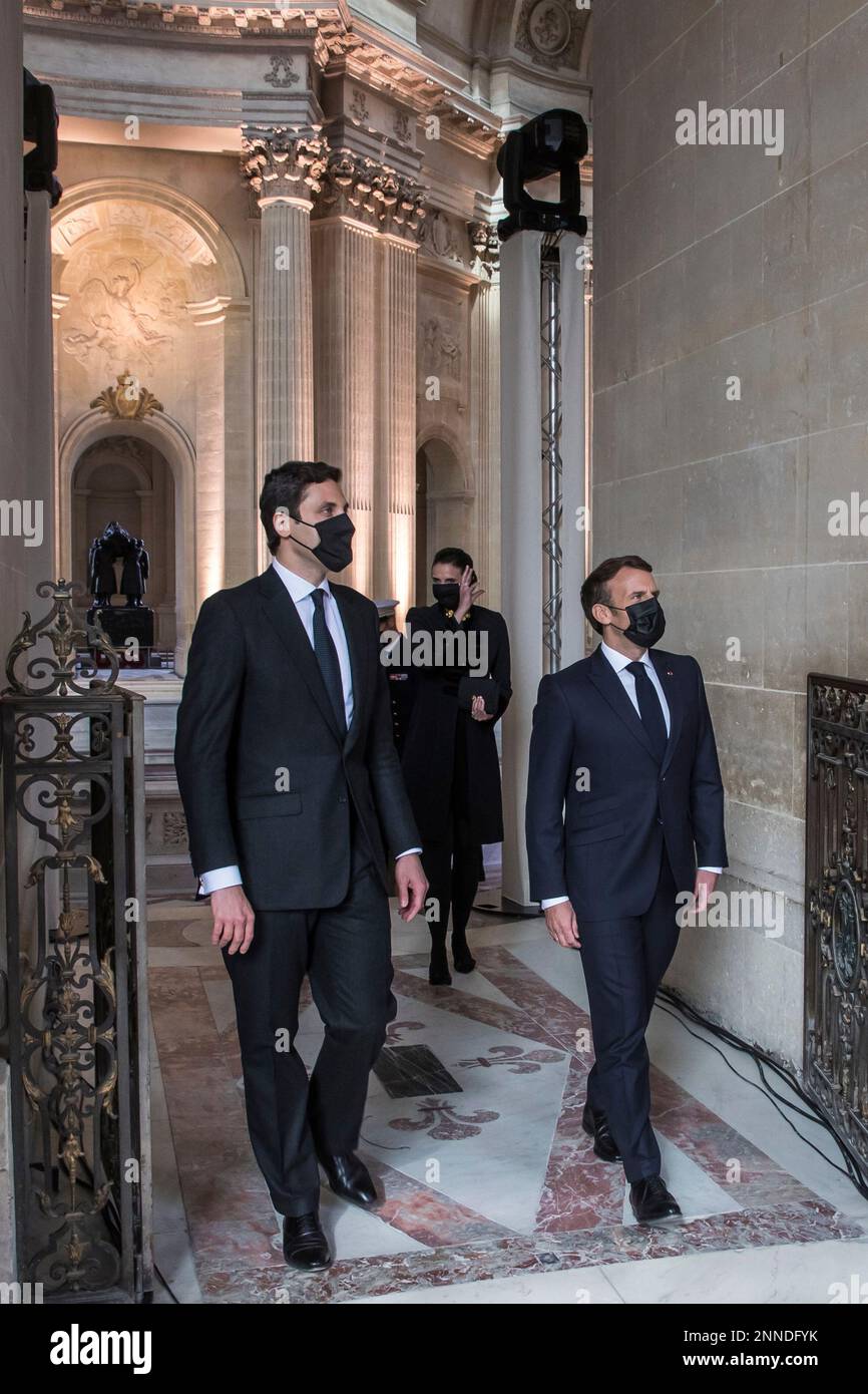French President Emmanuel Macron, right, speaks with Prince Jean ...