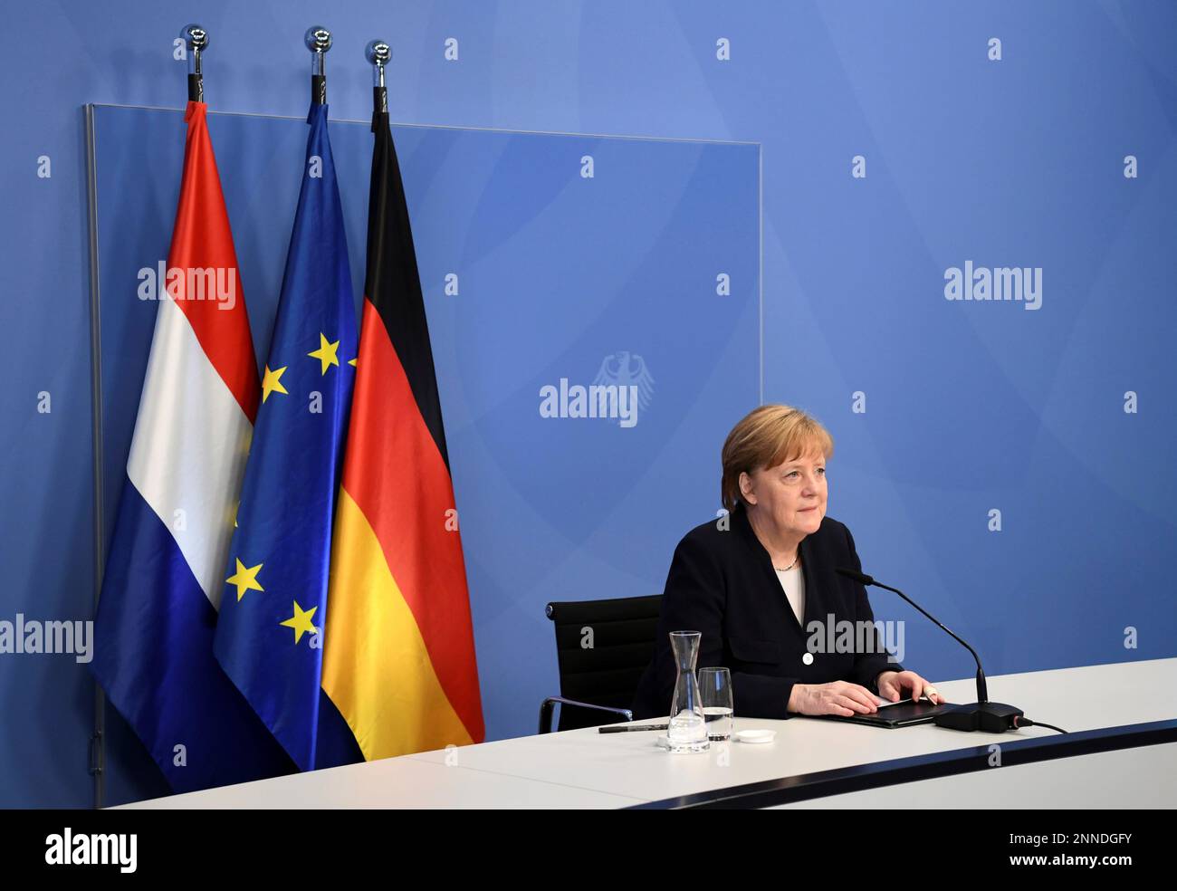 German Chancellor Angela Merkel arrives to attend a virtual event with ...
