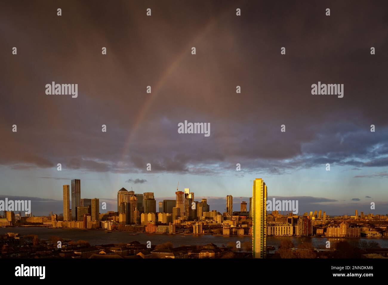 London, UK. 25th February, 2023. UK Weather: Sunset rainbow breaks over ...