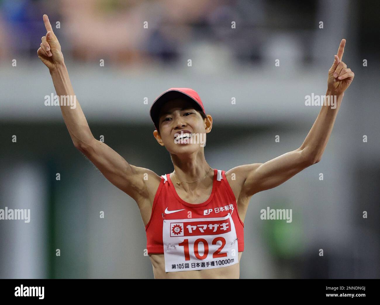Rurika Hironaka of Japan crosses the finish line during women's 10000m ...